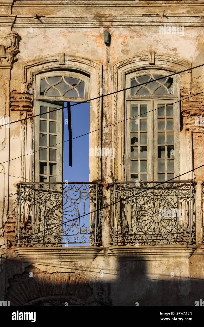 View of doors, windows in a ruined house facade in Cachoeira, a ...