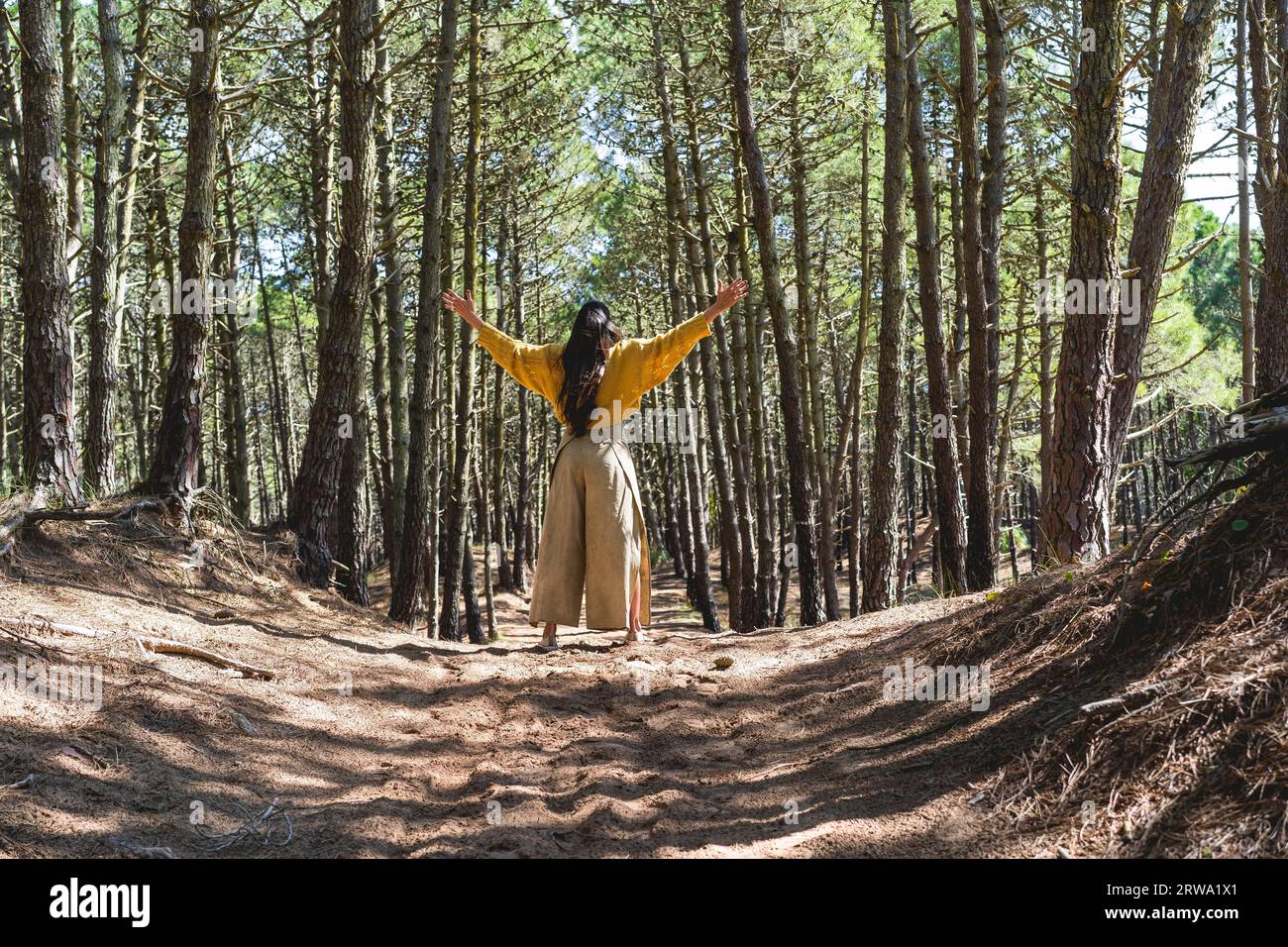 Woman on her back with open arms enjoying nature. Freedom concept Stock ...