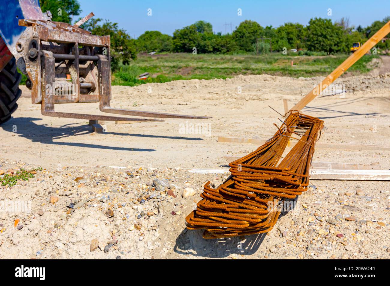Forklift machinery for delivery and transport is preparing to lift up ...