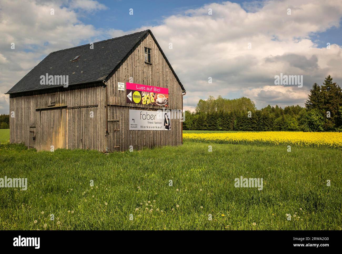 Advertising on the barn Stock Photo - Alamy
