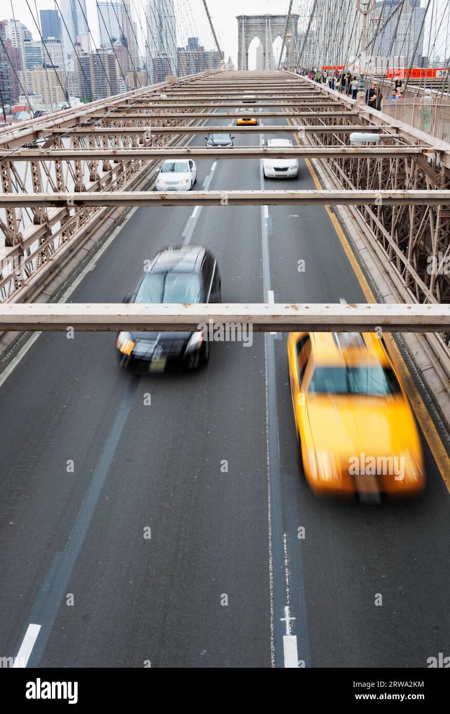 NEW YORK CITY, USA, JUNE 9: Cars driving on Brooklyn Bridge. June 9 ...