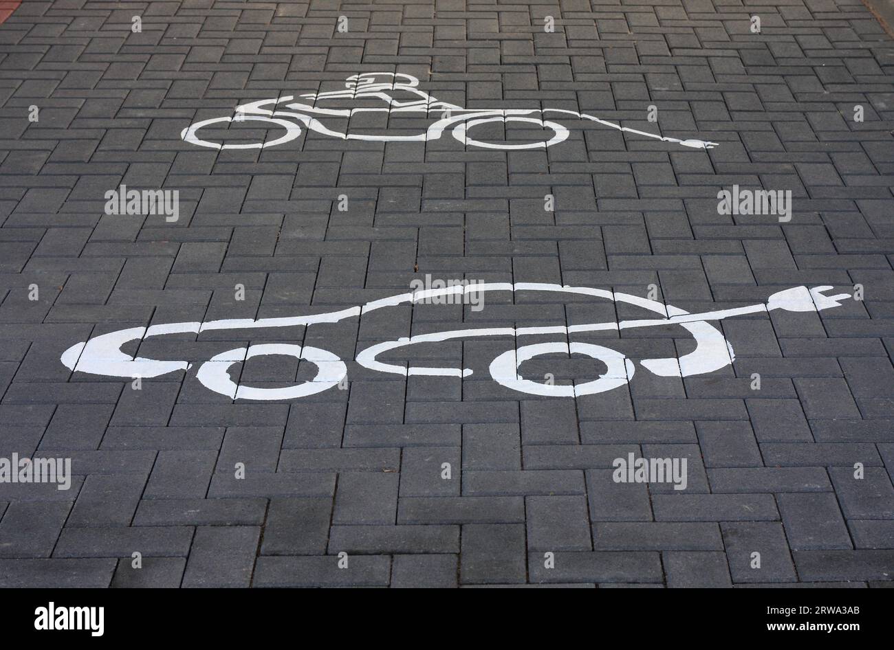 Pictograms at a solar filling station for two- and four-wheelers ...