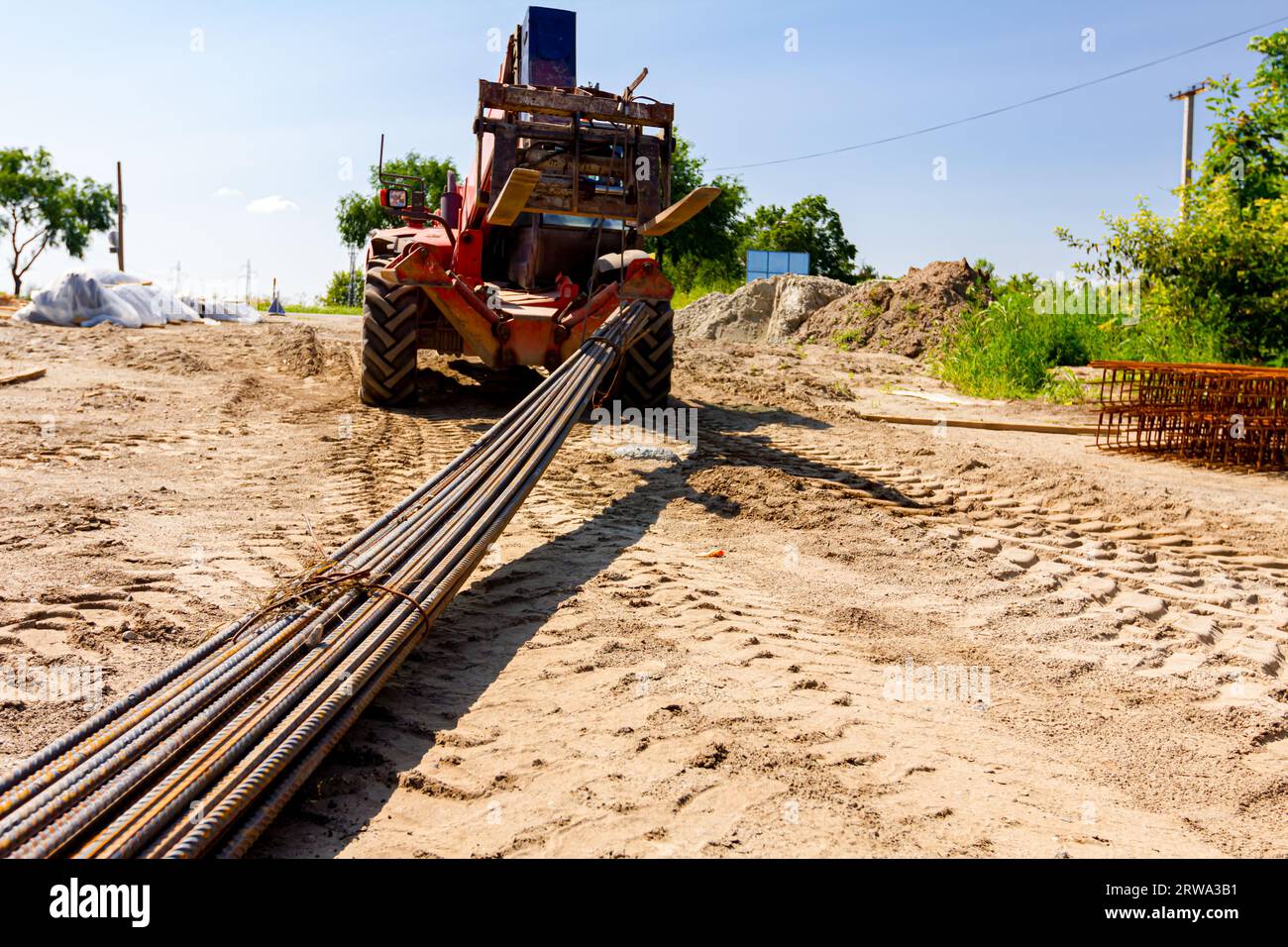 Forklift machinery for delivery and transport is lifting up selected ...