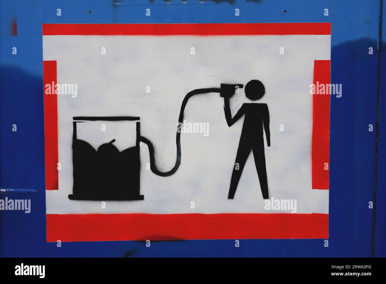 Graffiti in pictogram style, person holding the petrol pump to his head ...