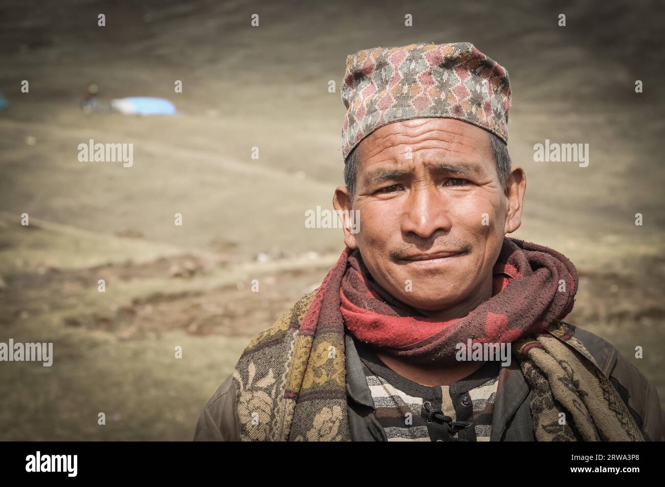 Dolpo, Nepal, circa May 2012: Native man with cap on his head and red ...