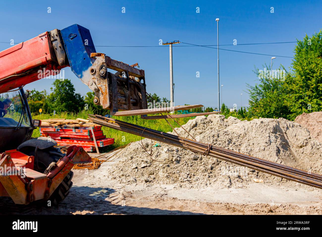 Forklift machinery for delivery and transport is lifting up selected ...