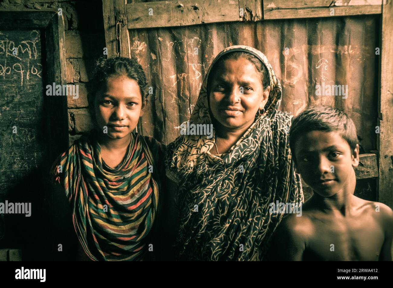 Khulna, Bangladesh, circa July 2012: Native children pose with their ...