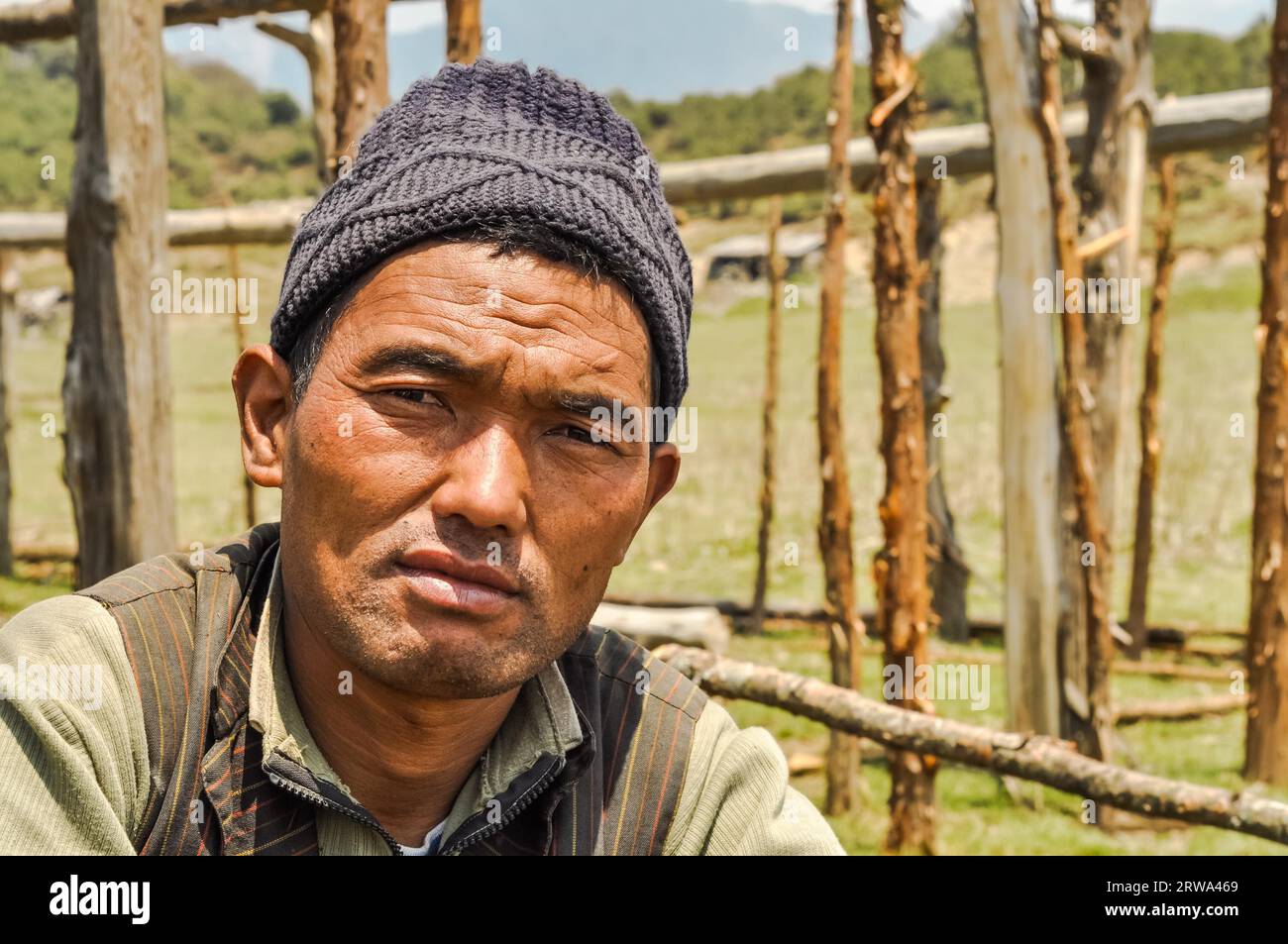 Beni, Nepal, circa May 2012: Native man with black knitted cap on his ...