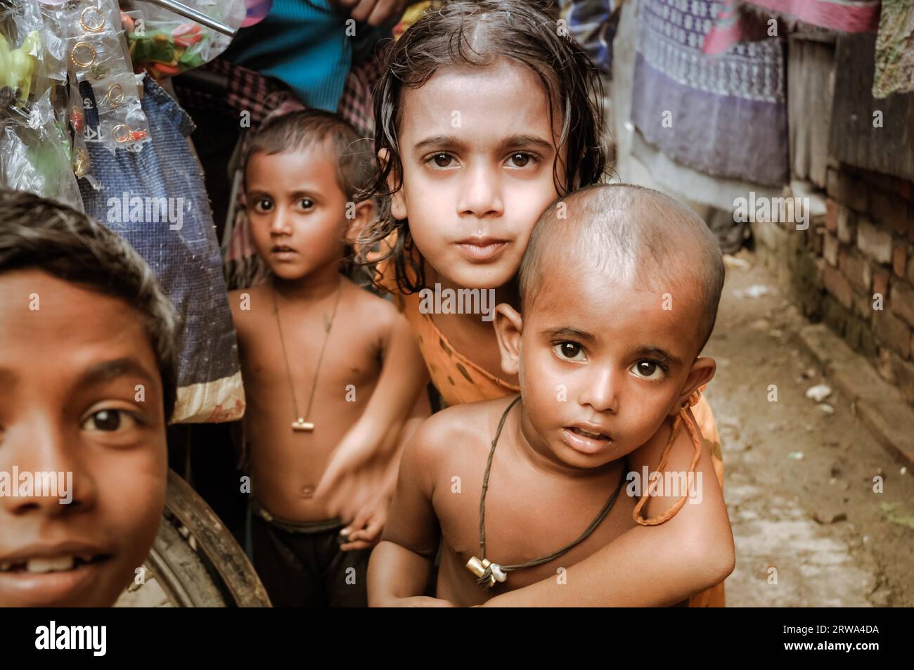 Khulna, Bangladesh, circa July 2012: Young native children with brown ...