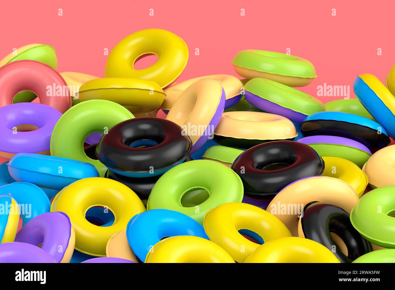 Pile of inflatable ring for swimming pool isolated on pink background ...