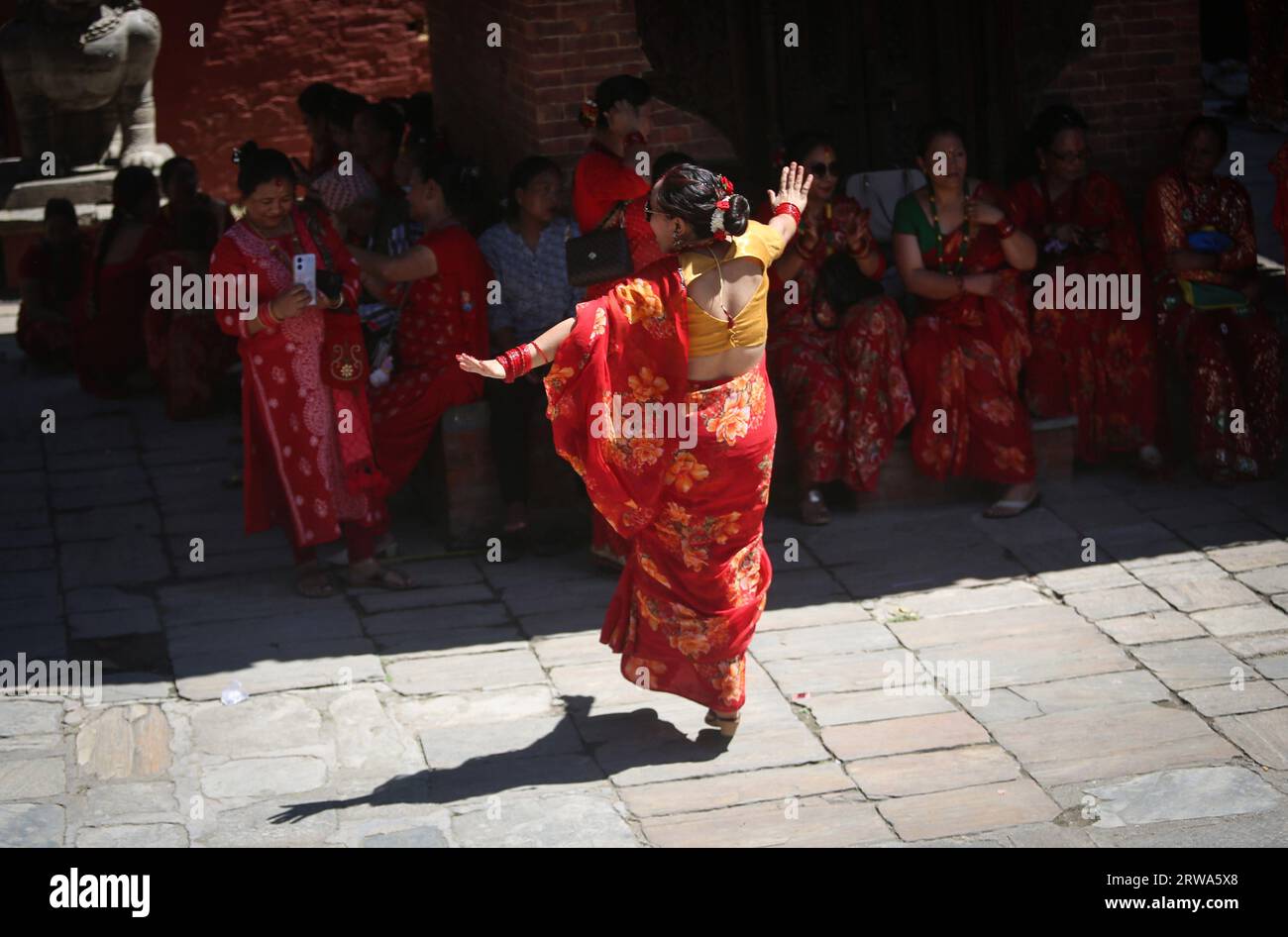 September 18, 2023, Kathmandu, Bagmati, Nepal: A Nepali woman dances in celebration of Teej ...