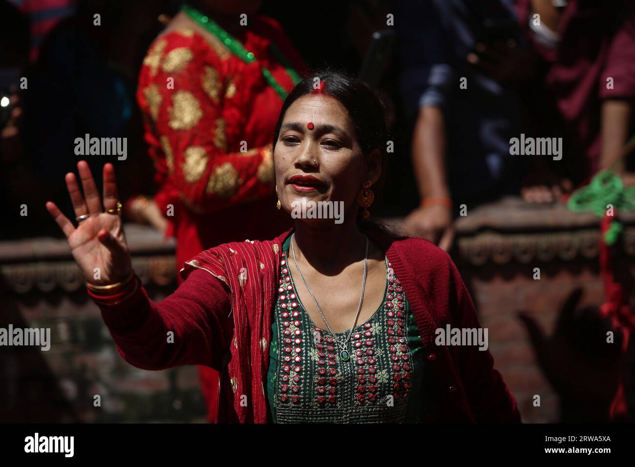 September 18, 2023, Kathmandu, Bagmati, Nepal: A Nepali woman dances in celebration of Teej ...
