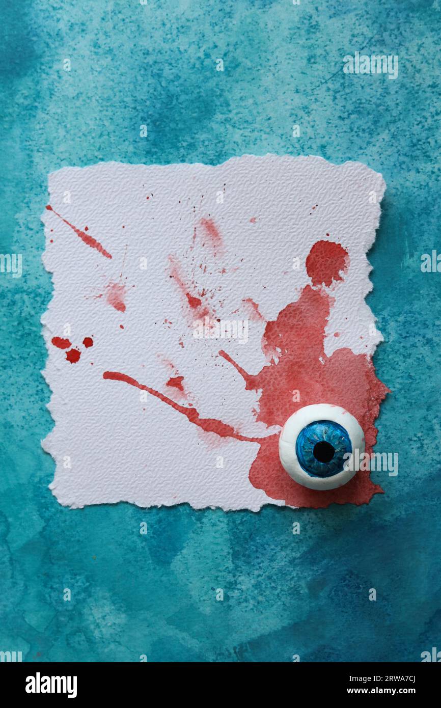 halloween card with a blood stain and an eyeball Stock Photo - Alamy