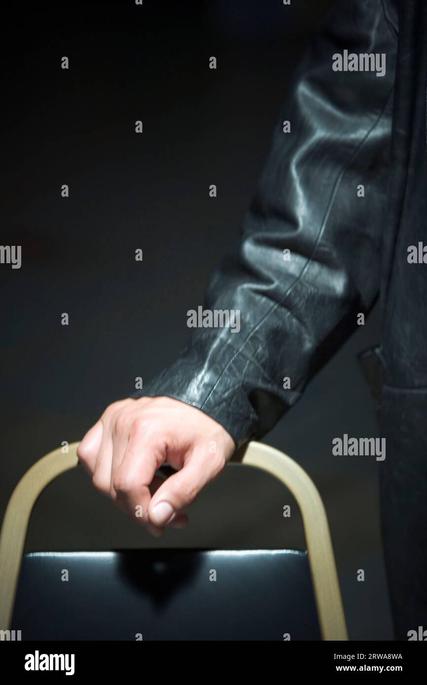 Jacket on back of chair hi-res stock photography and images - Alamy