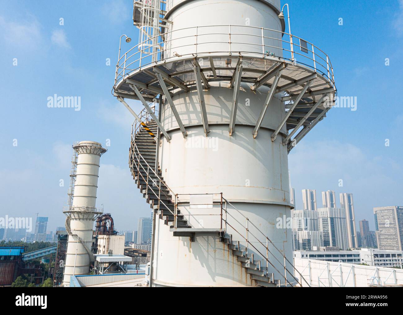 A staircase leading up the side of an industrial chimney in a thermal ...