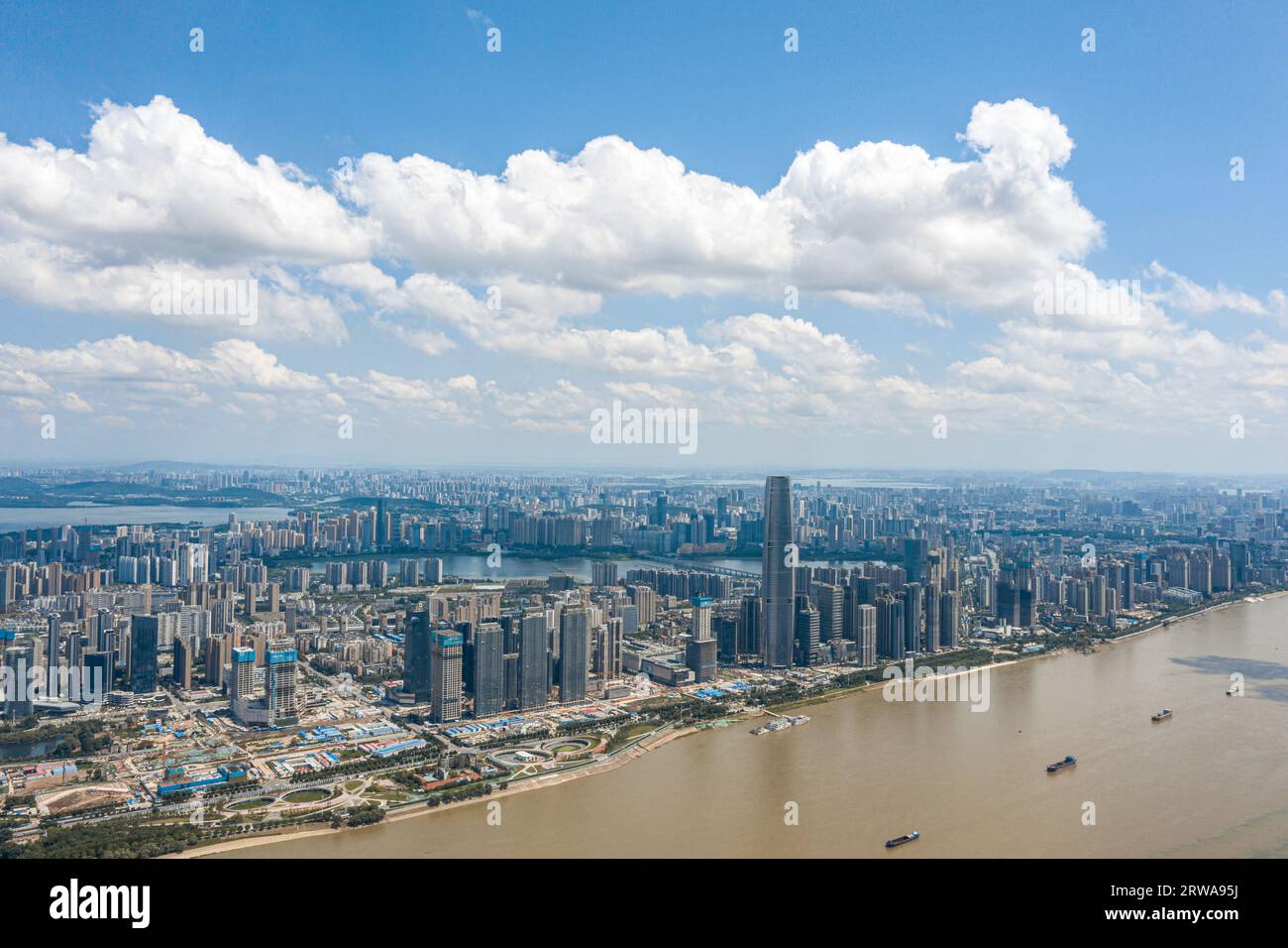 An aerial view of Wuhan skyline in China with modern skyscrapers along ...