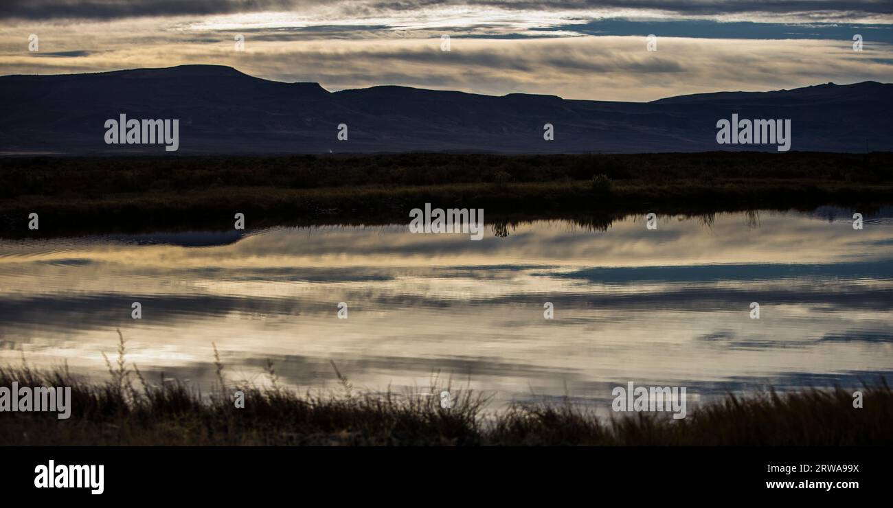 Clouds Reflected In A Pond In Surprise Valley, California Stock Photo ...