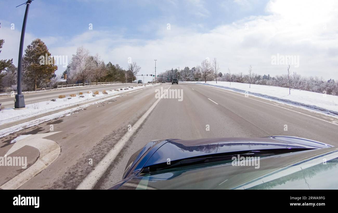 Driving on Suburban Road Post-Winter Storm Stock Photo - Alamy