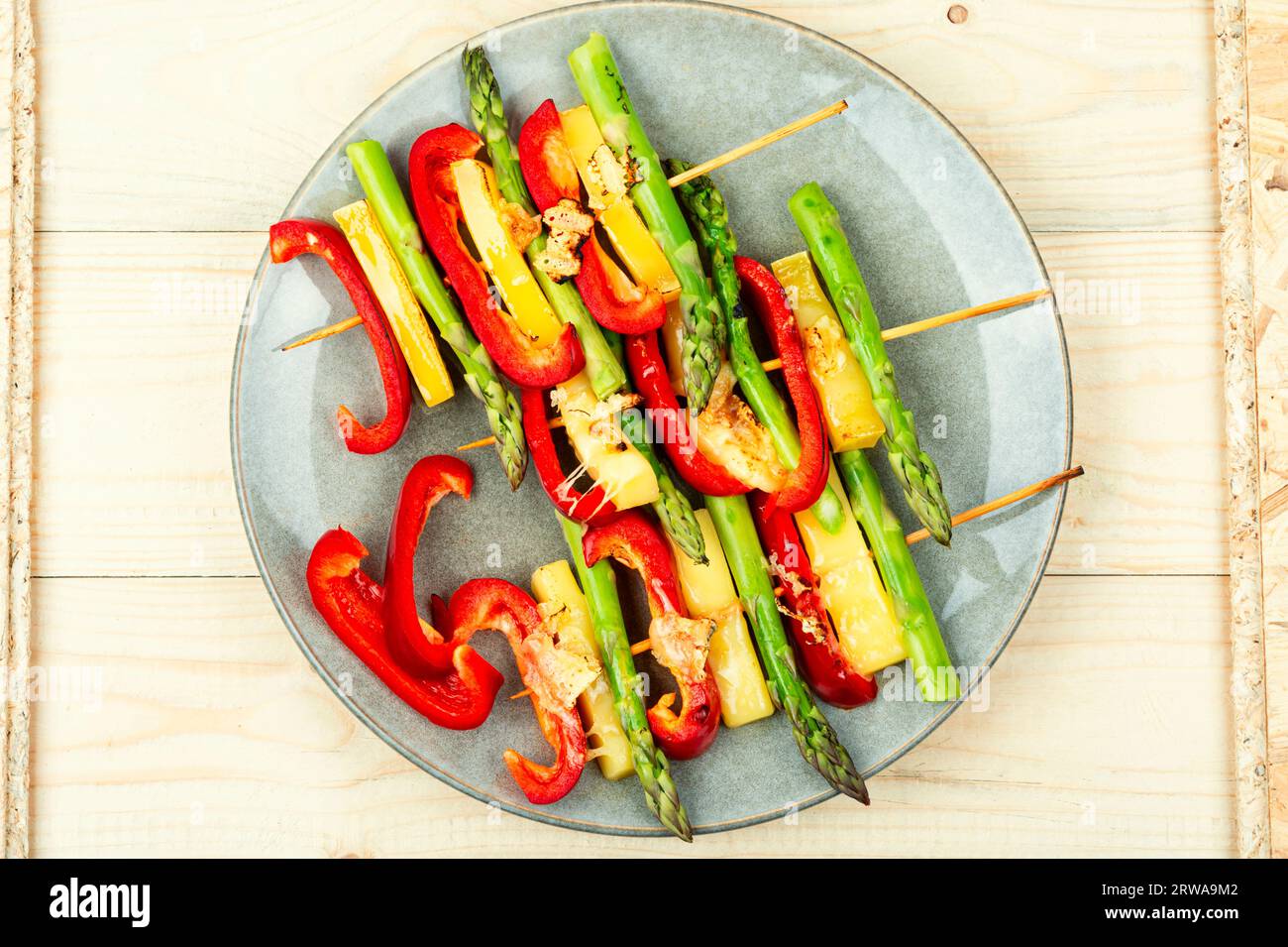 Homemade kebabs with bell peppers, green asparagus, hard cheese Stock ...