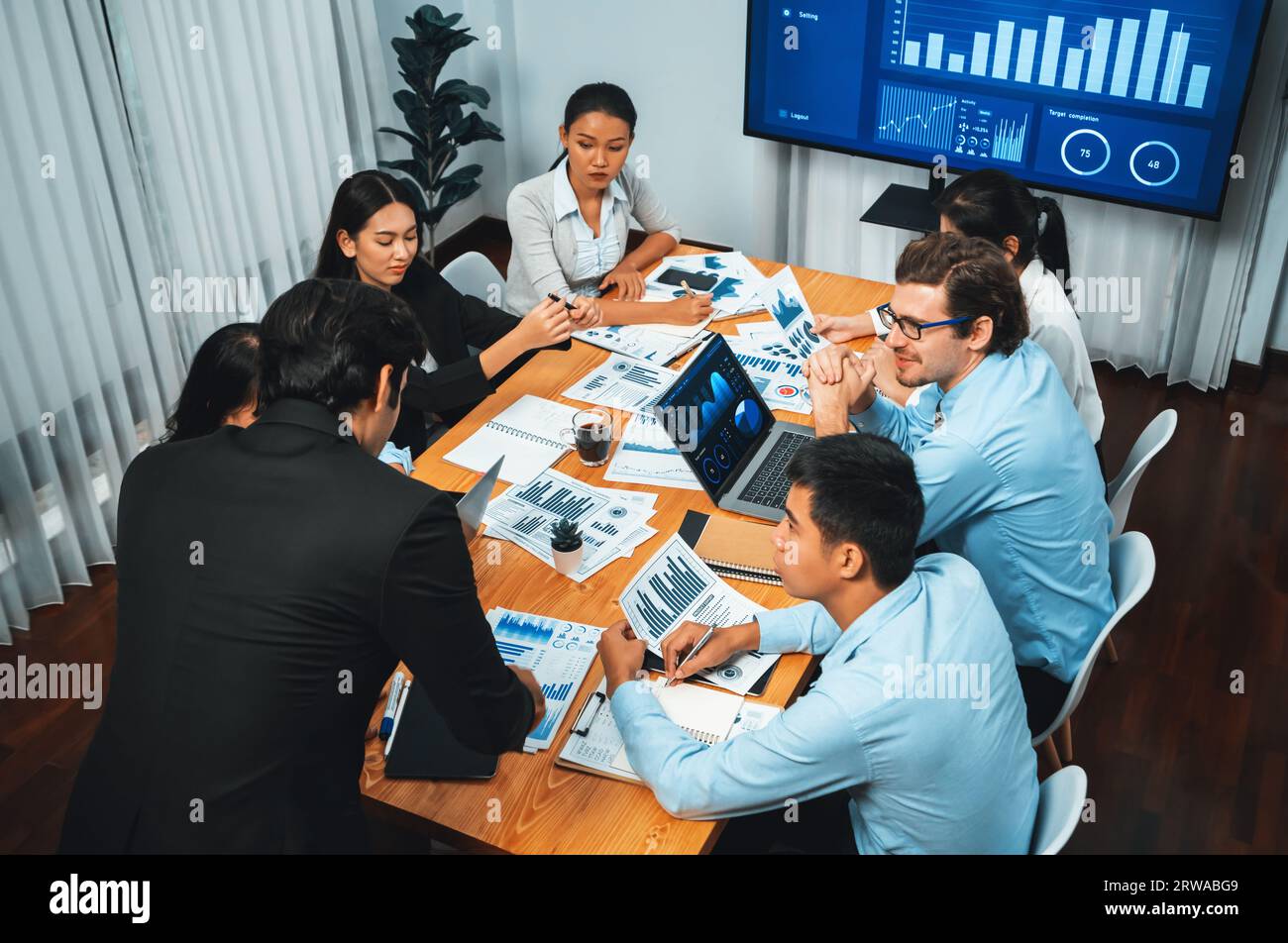 Diverse group of business analyst team analyzing financial data report ...