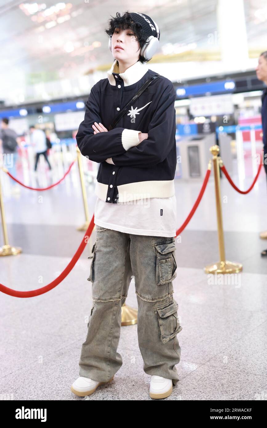 Chinese singer and dancer Lu Keran appears at the airport in Beijing ...