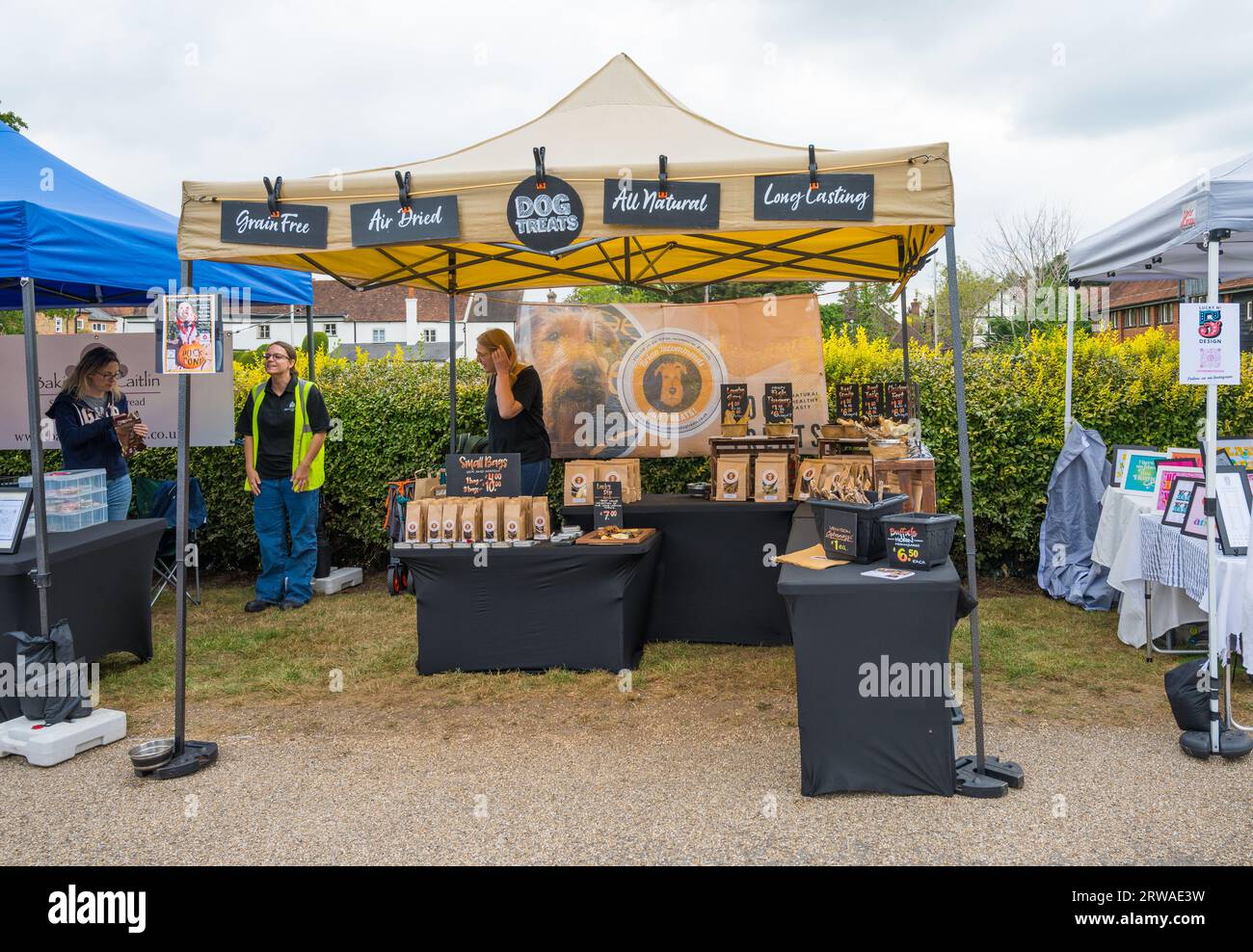 Market stall at Ruislip Duck Pond artisan market, selling dog treats ...