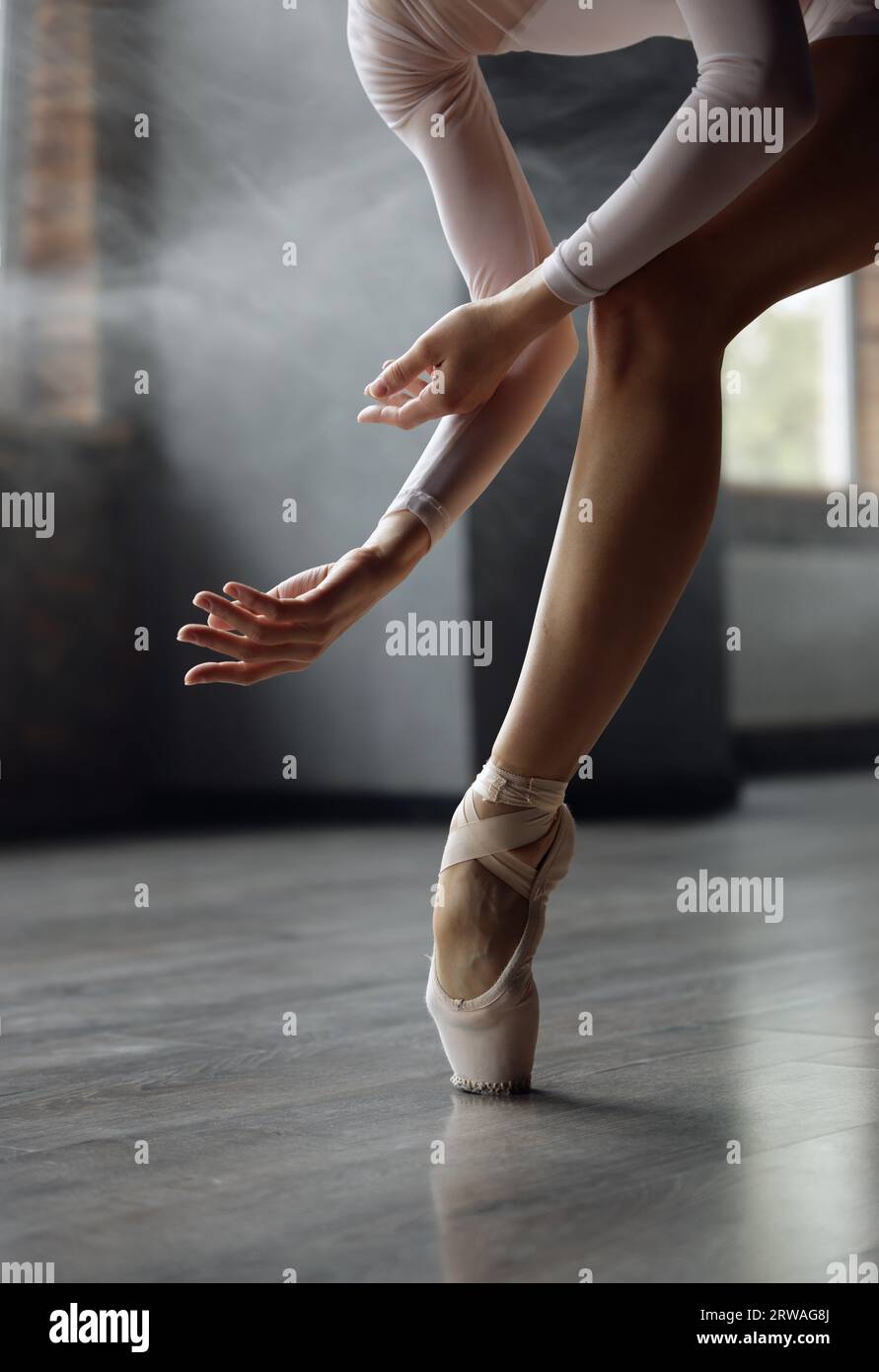 Closeup cropped shot of ballerina in ballet pose performing classical dance Stock Photo - Alamy