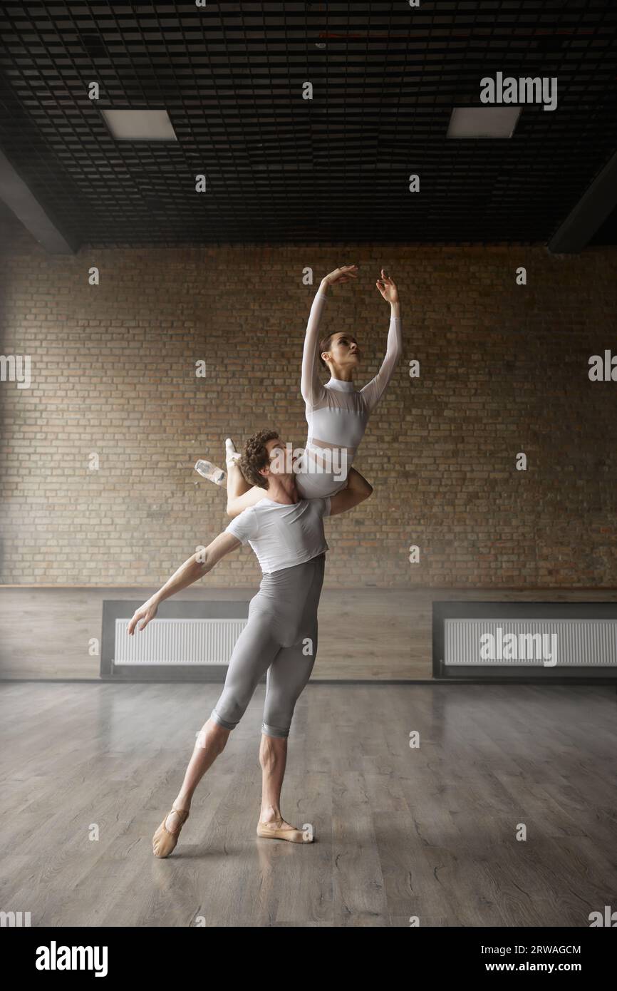 Artists graceful dance movement, ballet dancers performing beautiful ...