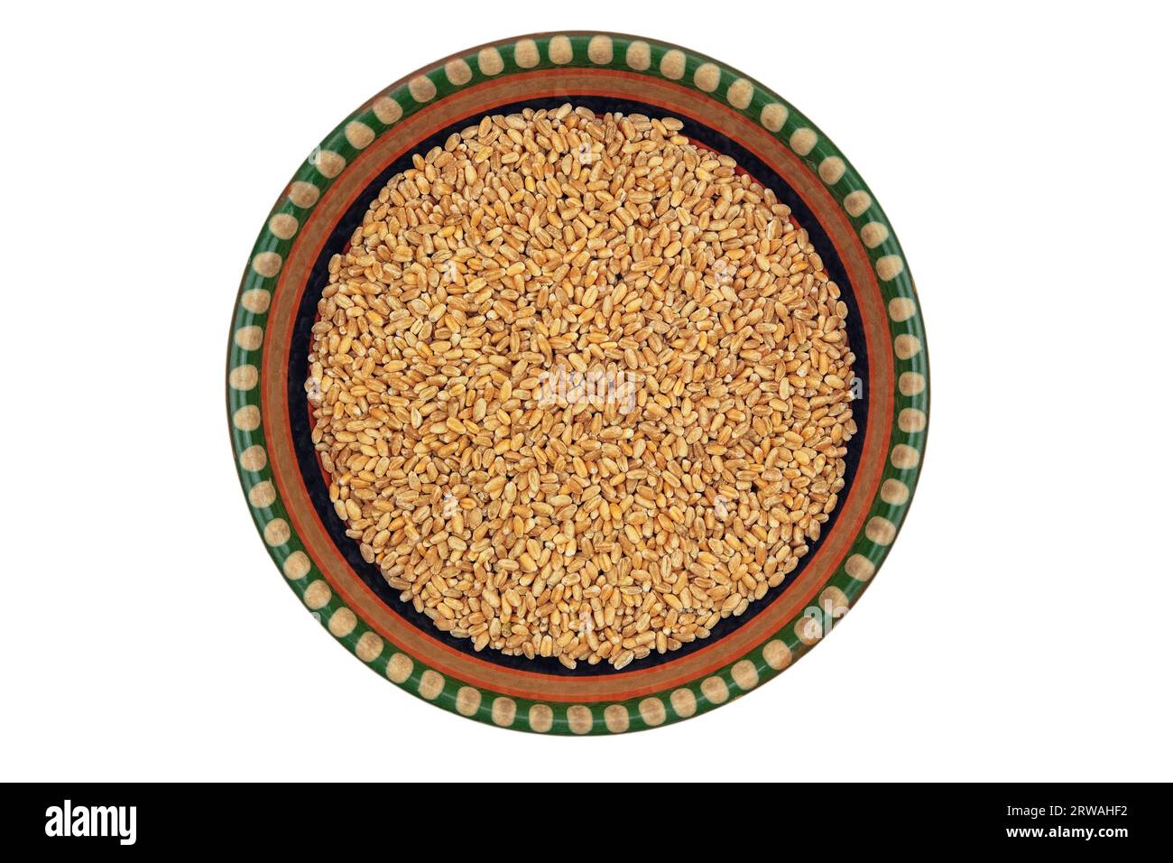 Wheat in a clay bowl isolated on white background. Country style. Top ...