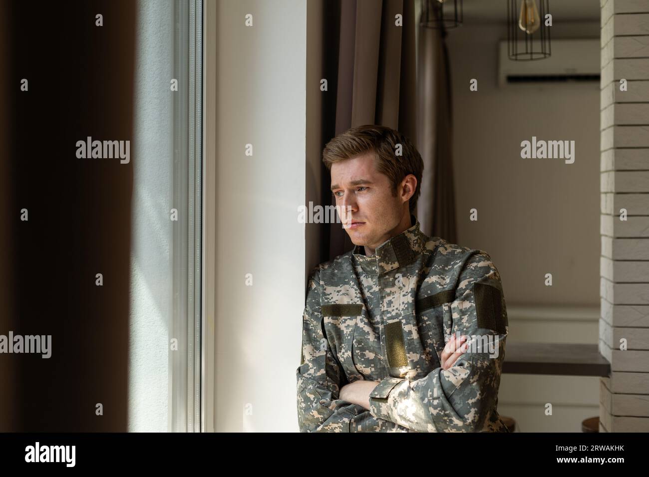 Portrait of middle aged sad, desperate military man looking thoughtful ...