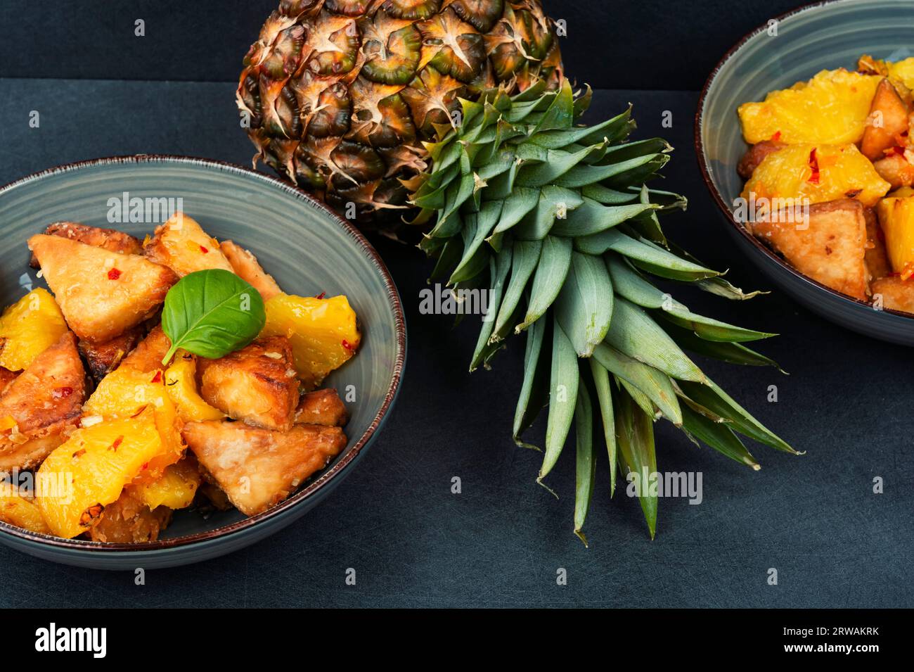 Deep-fried veggie tofu with pineapple and chili Stock Photo - Alamy