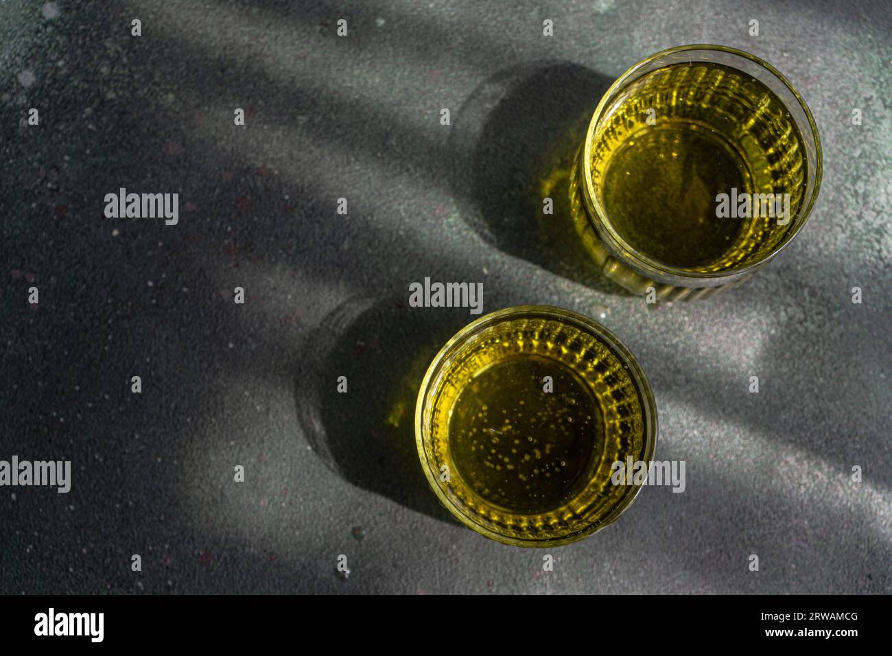 Overhead view of two Glasses of feijoa lemonade Stock Photo - Alamy