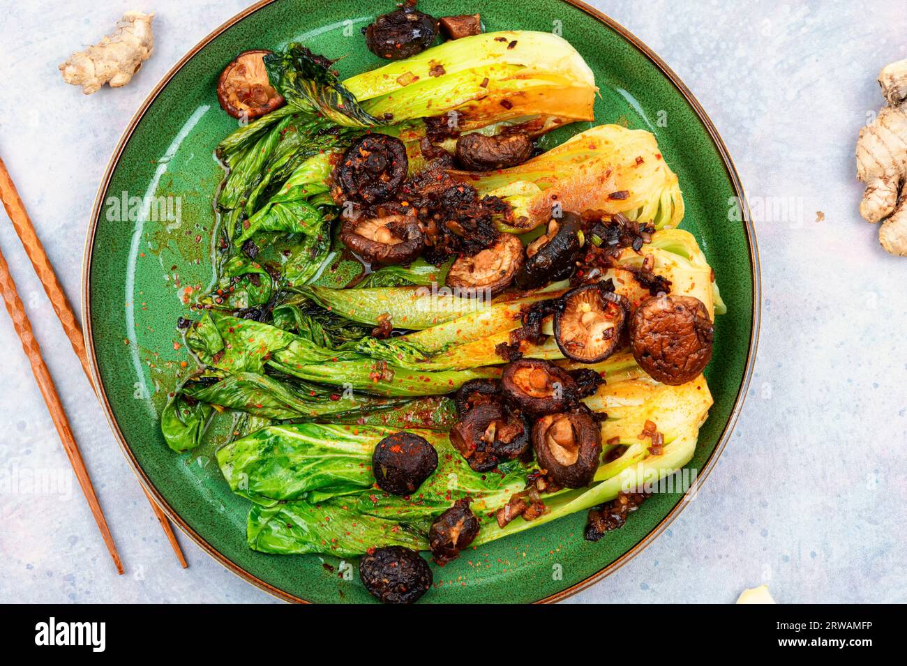 Chinese fried Pak Choi with shitake mushrooms. Asian vegan food Stock ...