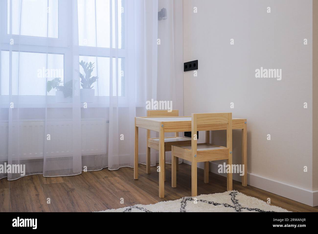 Table inside with chairs and furniture hi-res stock photography and ...