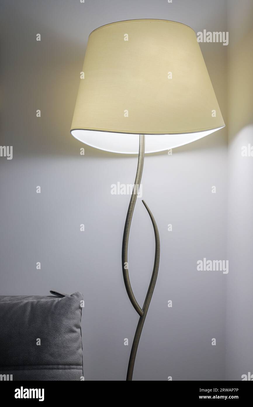 Glowing floor lamp close-up in the room interior Stock Photo - Alamy