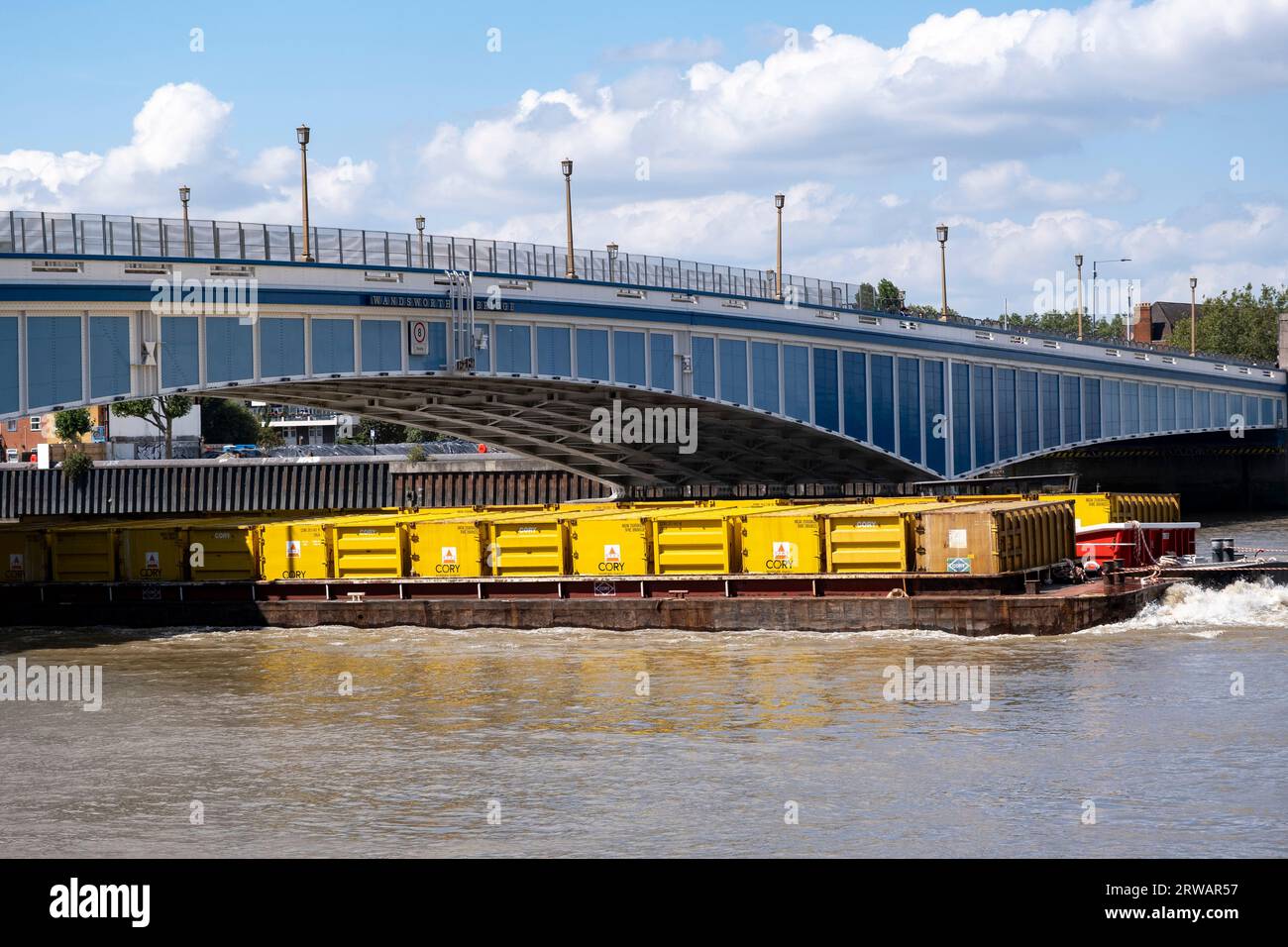 Downstream waste barges operated by Cory Riverside passes under span at ...