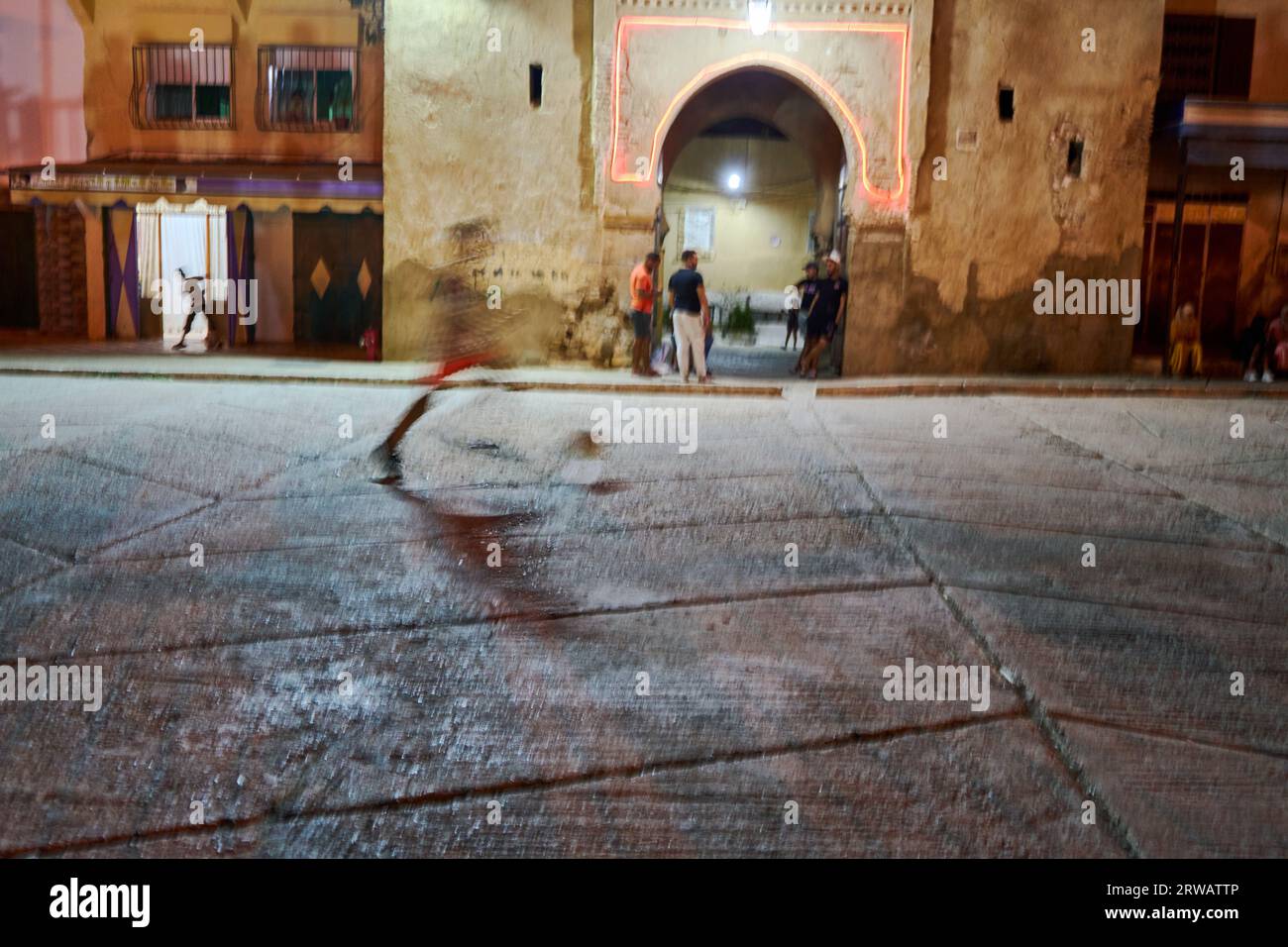 Blurred child playing soccer in an old Moroccan street Stock Photo - Alamy Blurred child playing soccer in an old Moroccan street Stock Photo - Alamy
