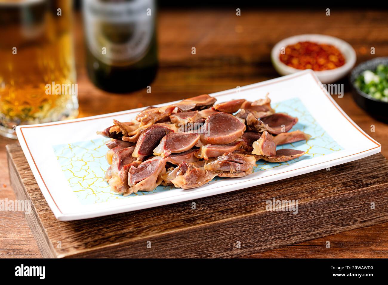 Marinated duck gizzard in Spiced Sauce Stock Photo - Alamy
