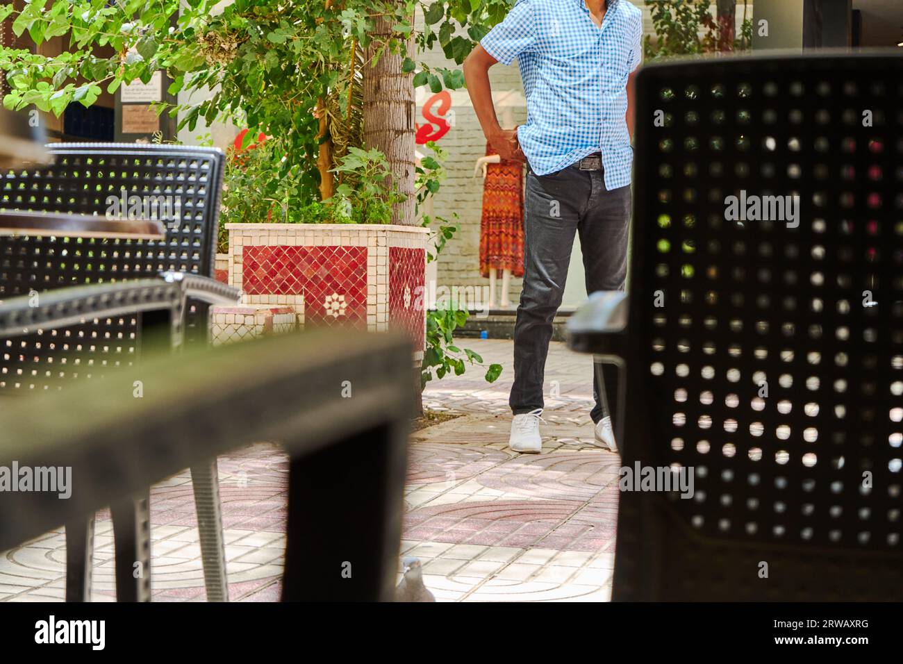 Beautiful man walking on arabic hi-res stock photography and images - Alamy