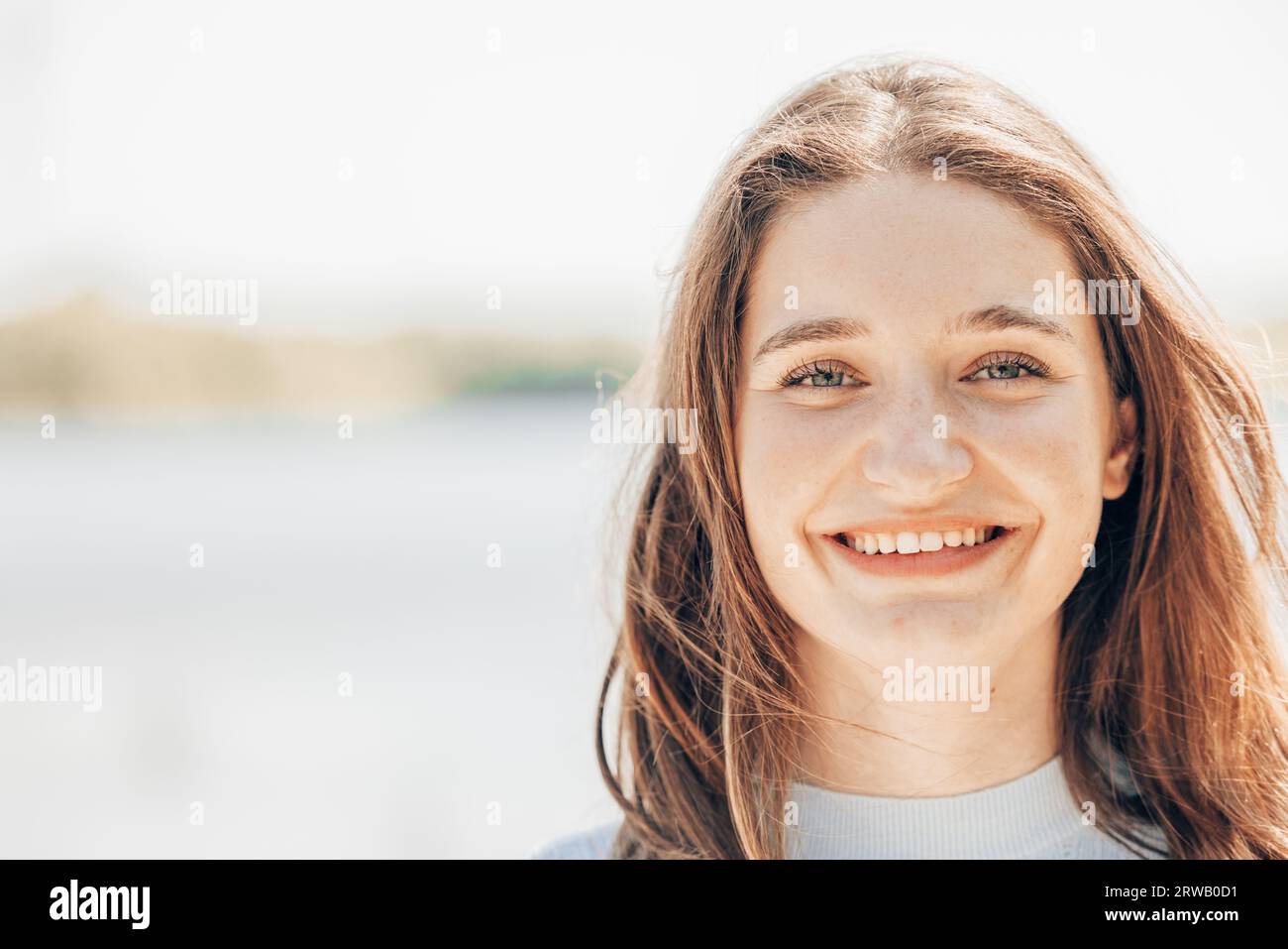 Meet a cheerful and captivating millennial woman with enchanting brown ...