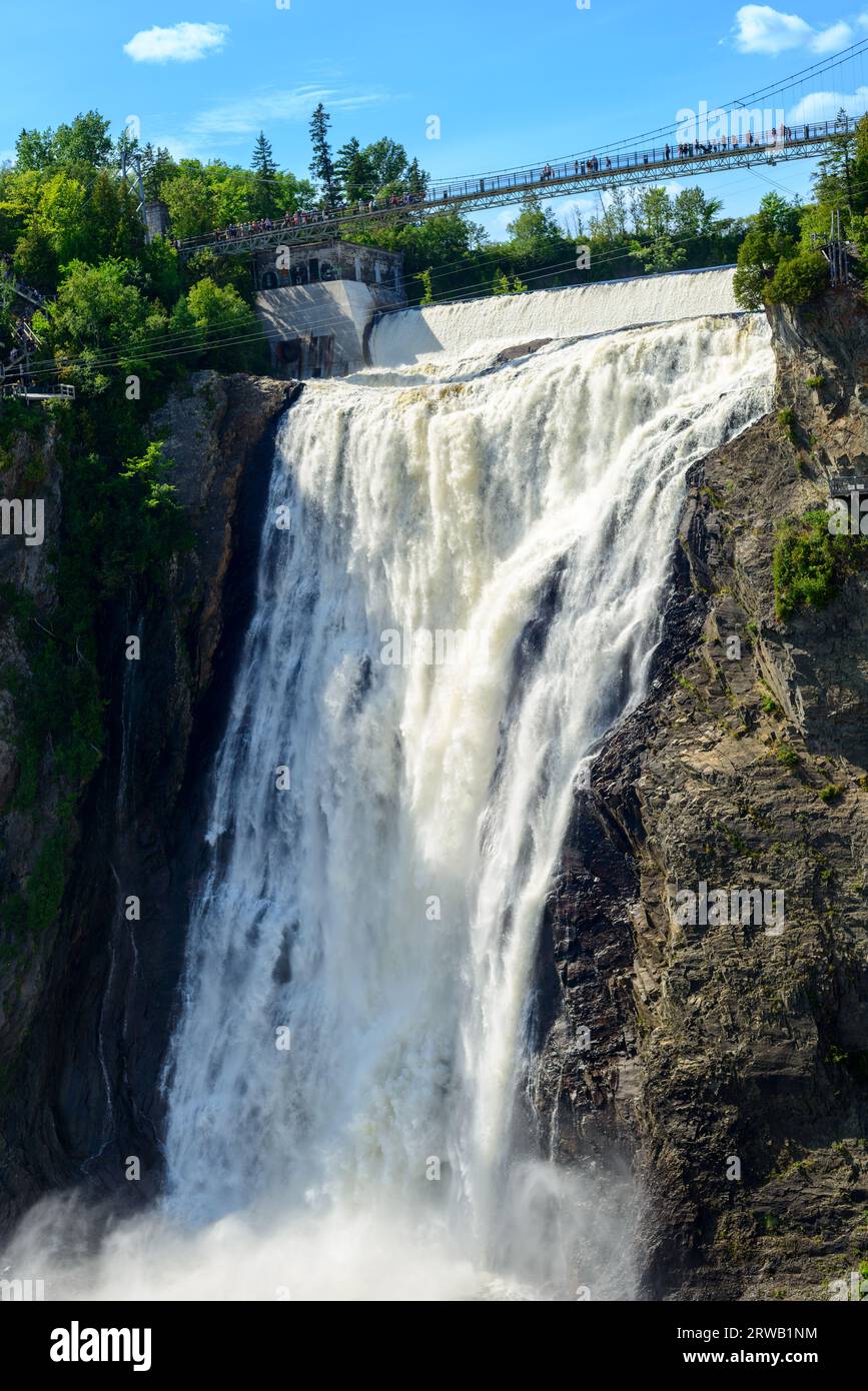 Bridge over a waterfall Stock Photo - Alamy