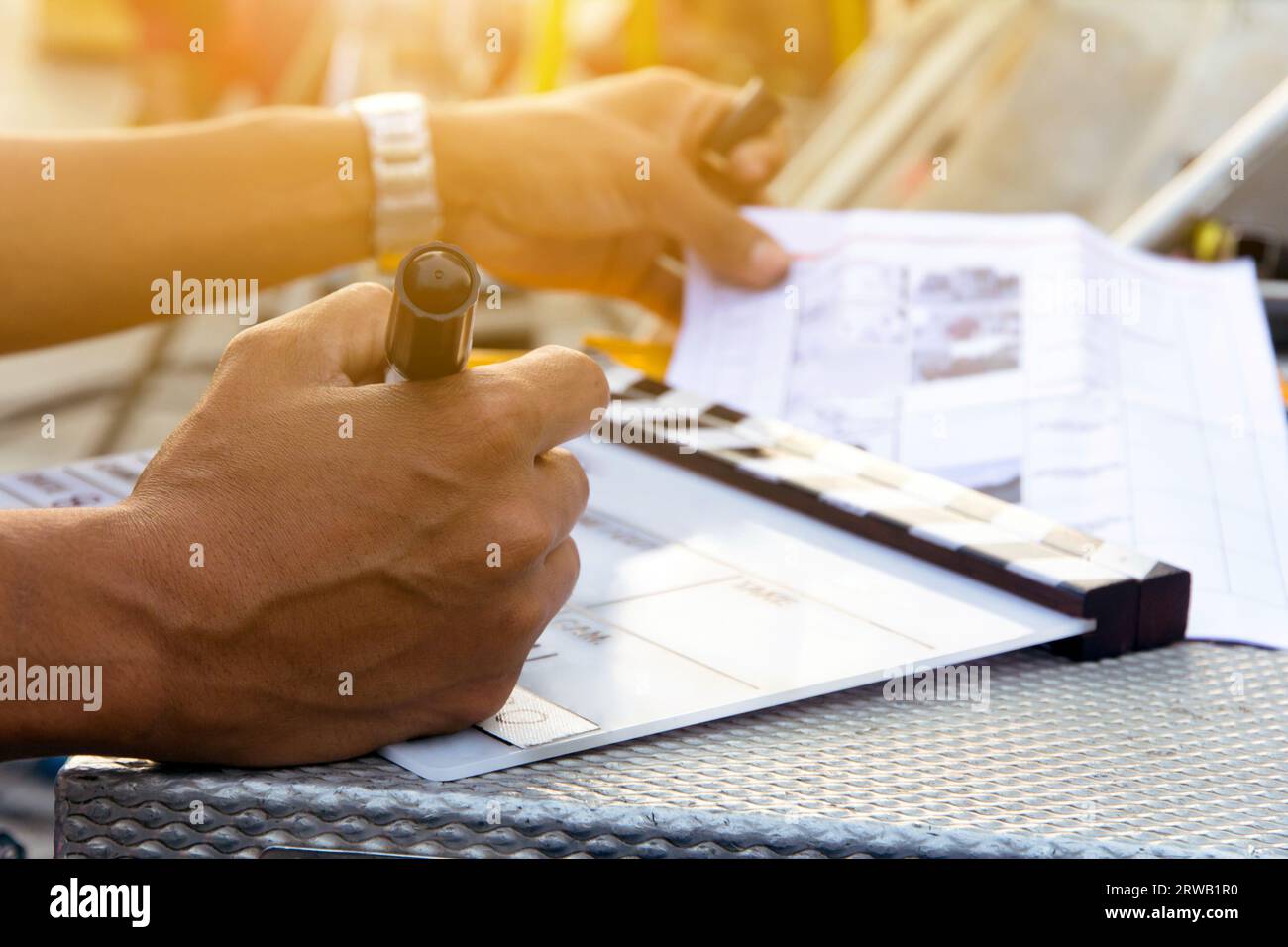 Labeling the Slate on set, film slate and film crew production set ...