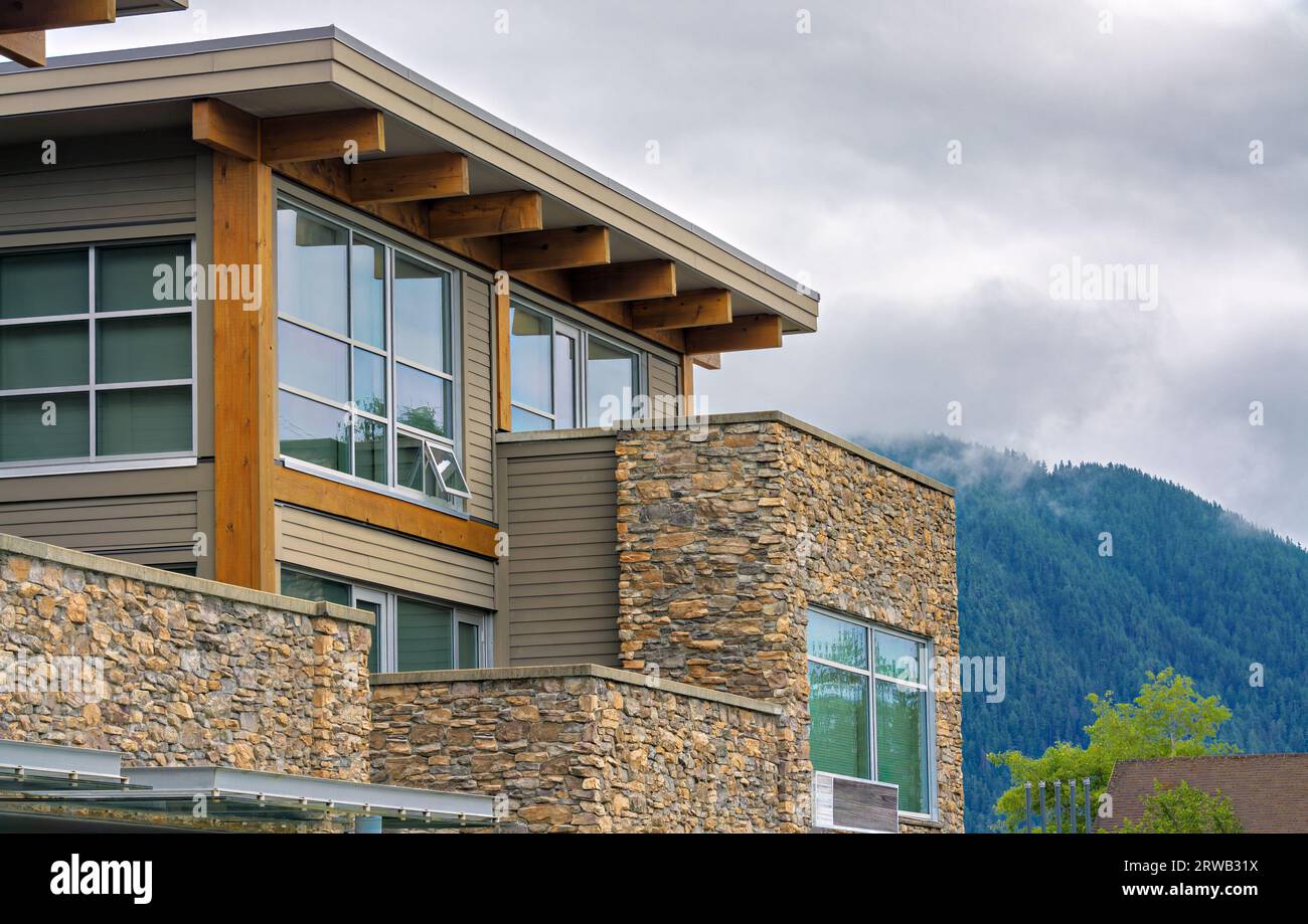Top of nice residential building on foggy mountain background Stock ...