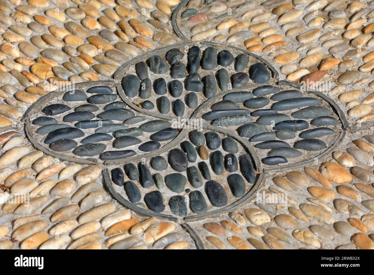 Rock mosaic pattern in a park, China Stock Photo - Alamy