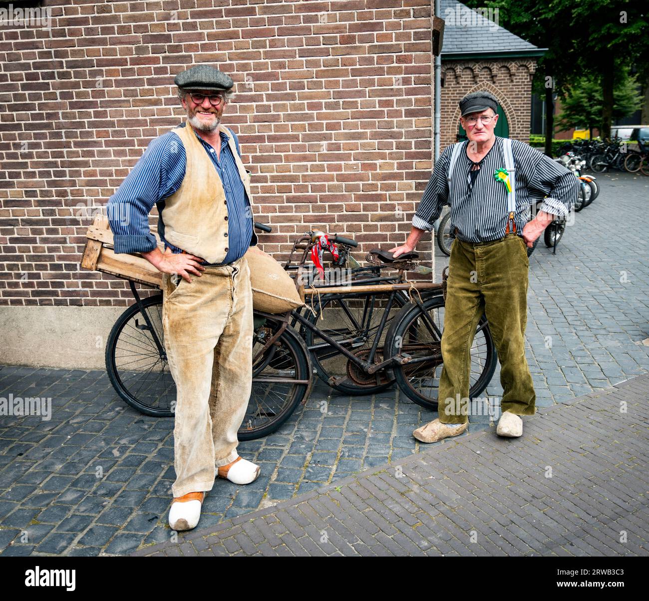 traditional old dutch clothes and wooden shoes on the street Stock ...