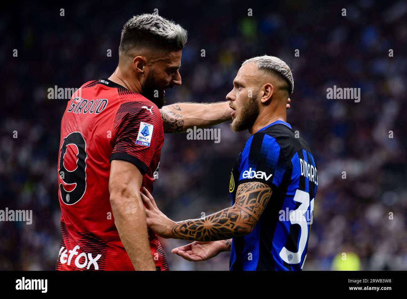 Milan, Italy. 18 September 2023. Olivier Giroud of AC Milan speaks with ...