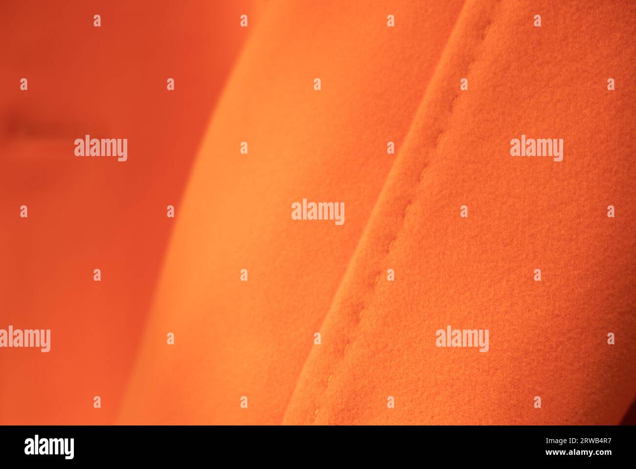 Close up texture of luxurious orange cashmere fabric on coat Stock ...