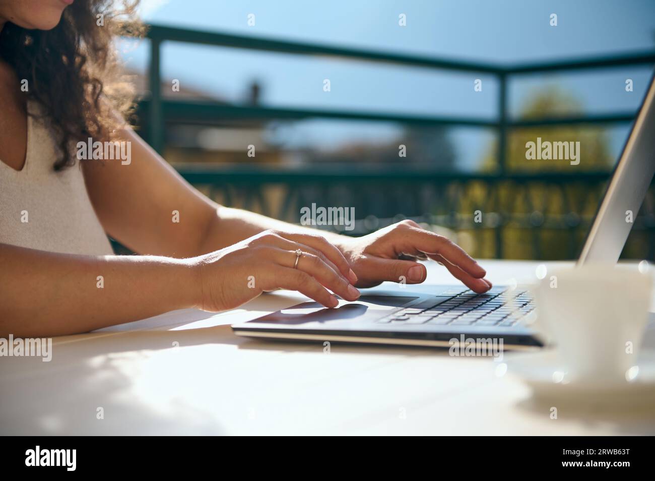 Close-up. Woman's hands on laptop keyboard. Female entrepreneur ...