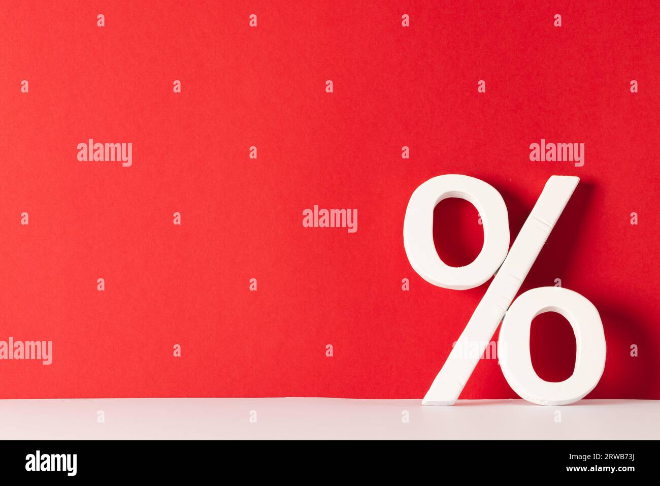 White percent sign with copy space against red background Stock Photo ...