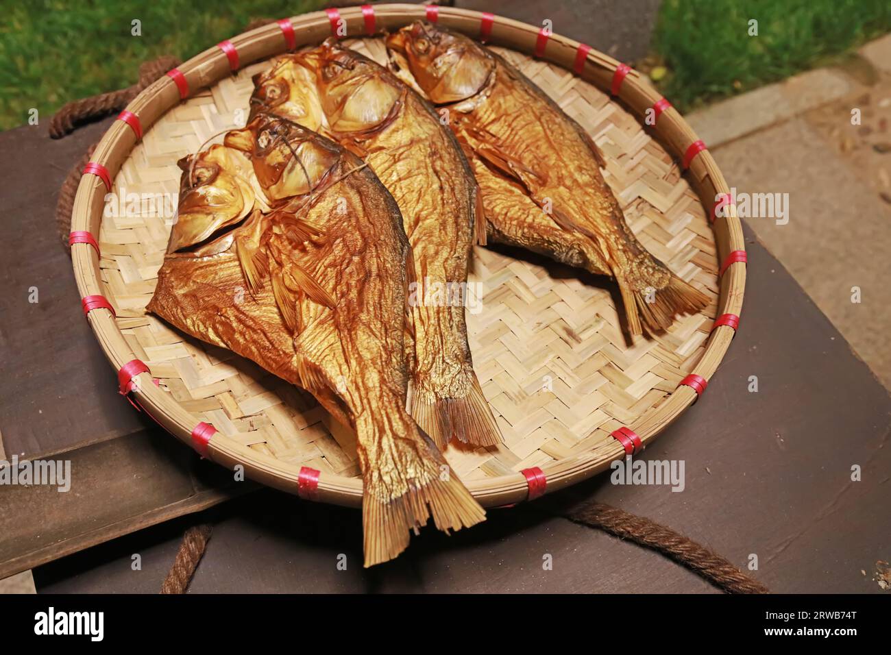 Grilled fish with traditional Chinese food Stock Photo - Alamy